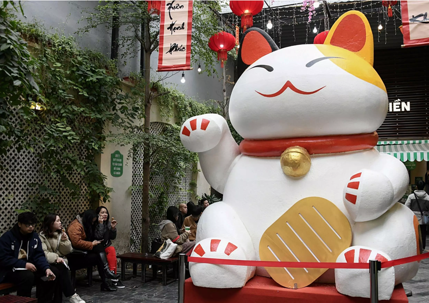 Tìm hiểu ý nghĩa bức ảnh con mèo và con rắn trong phong thủy